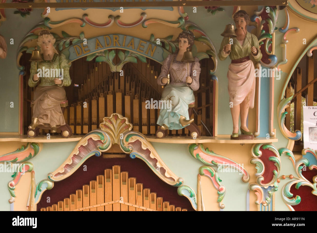 Details of a traditional Dutch barrel organ being operated in flower ...