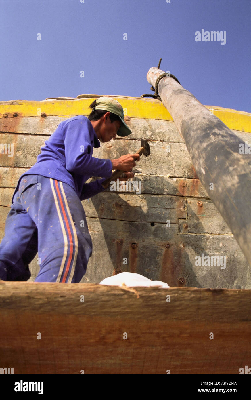 Vietnamese fisherman repairing fishing hi-res stock photography and ...