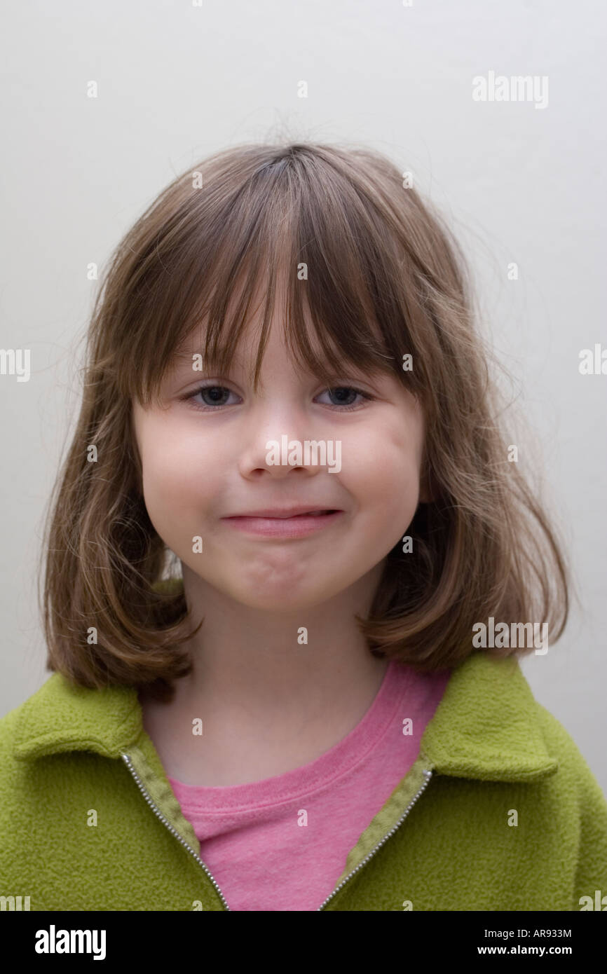 Young girl with crooked smile Stock Photo - Alamy