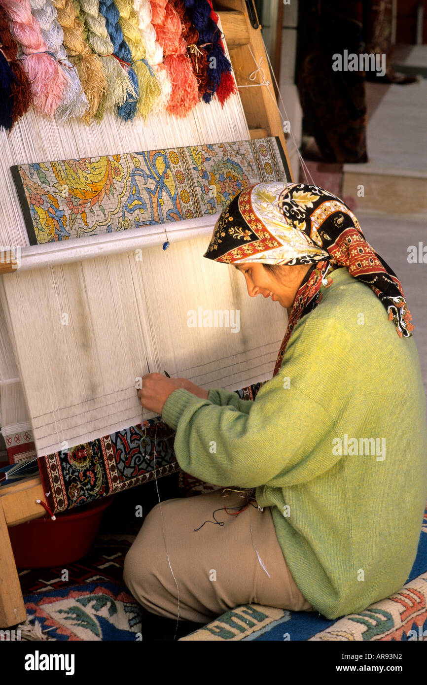 Portrait of woman making rugs by hand in Istanbul Turkey Stock Photo ...