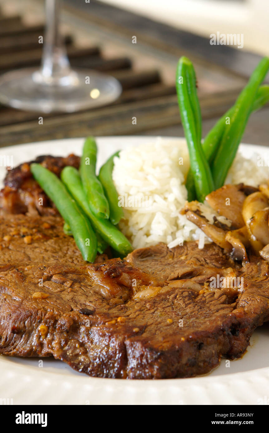 Cooked Ribeye meal rice green beans and mushrooms close up Stock Photo ...