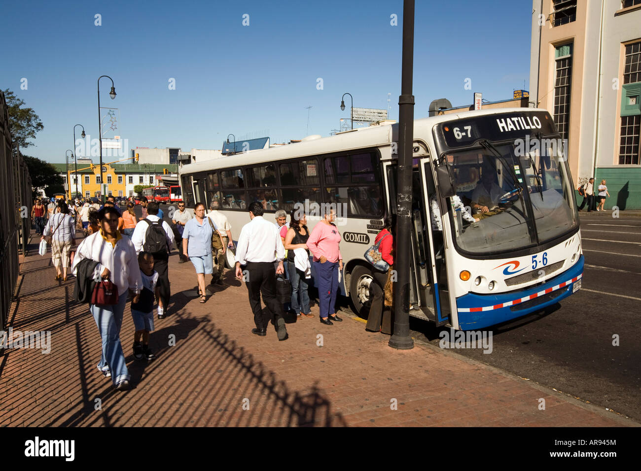 Costa Rica San Jose passengers boarding local bus to Hatillo on Avenida ...