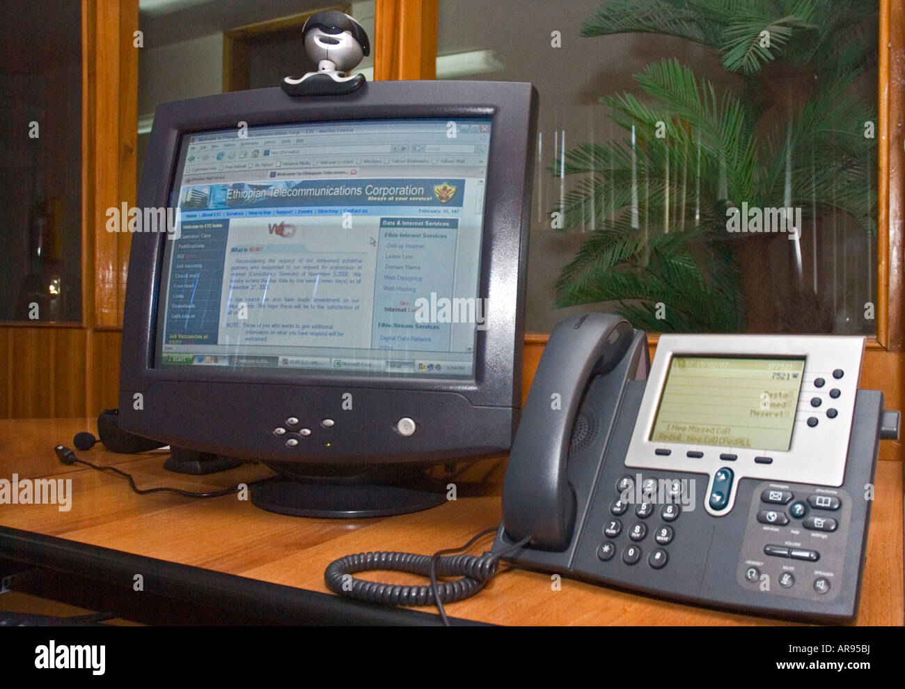 Computer screen and digital telephone (latest technology) at the ...
