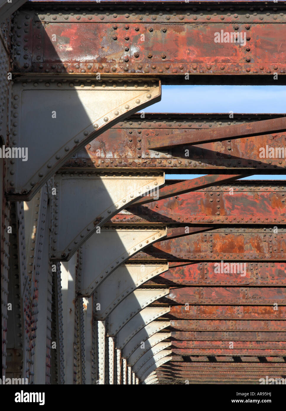 Rusty iron girders of a closed and disused railway bridge Stock Photo ...