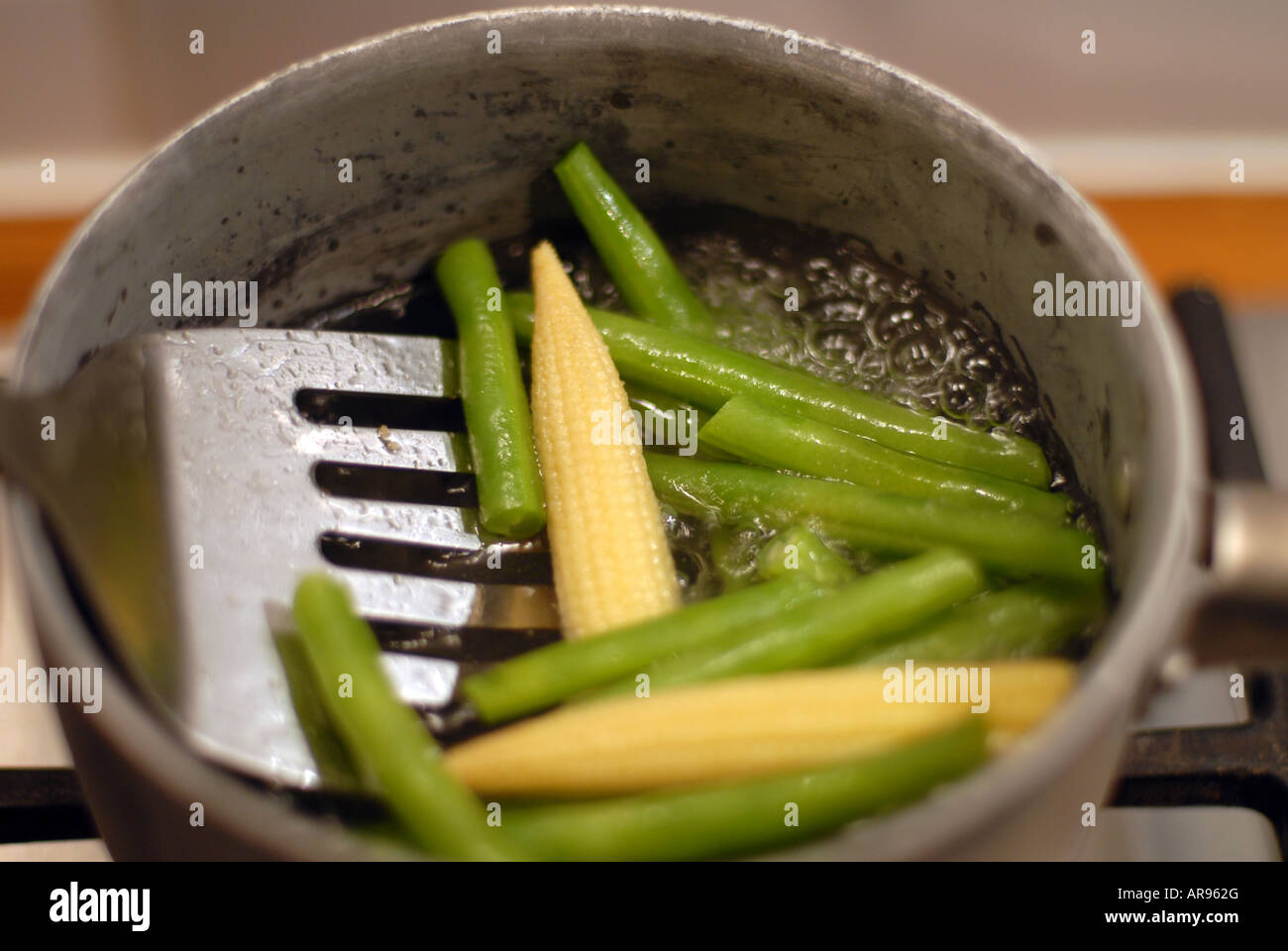 boiling vegetables in a pan, fresh veg, healthy eating Stock Photo - Alamy