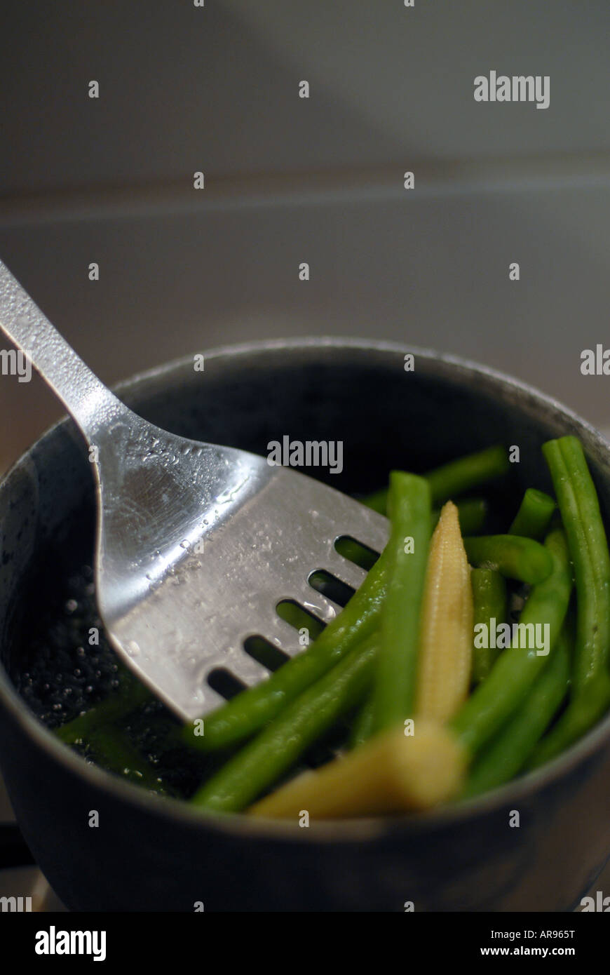 boiling vegetables in a pan, fresh veg, healthy eating Stock Photo - Alamy