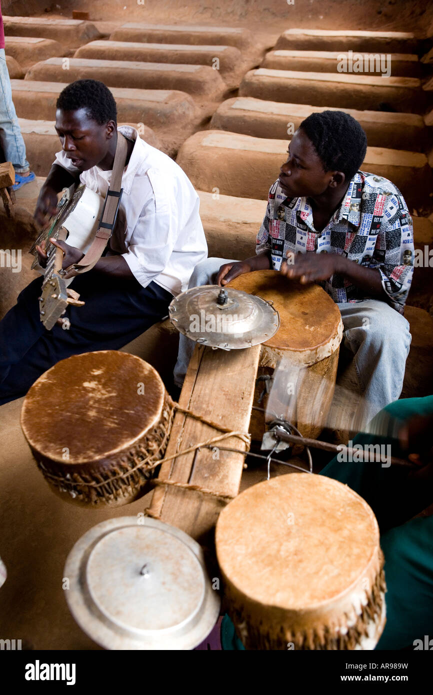 Musicians from Malawi rehearsing at a village community centre in ...