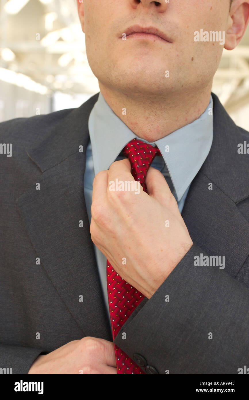 Man in red suit checks hi-res stock photography and images - Alamy