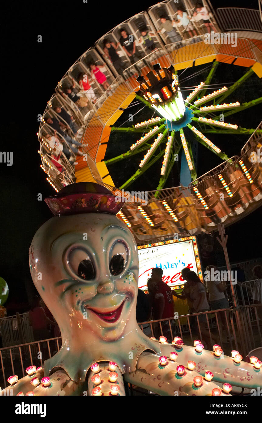 Carnival rides at night Stock Photo - Alamy
