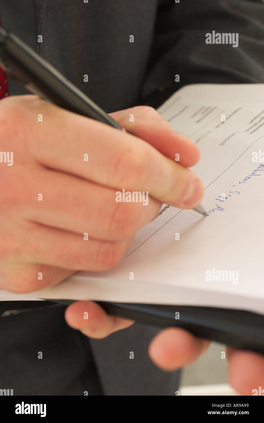 Male hand writing Stock Photo - Alamy
