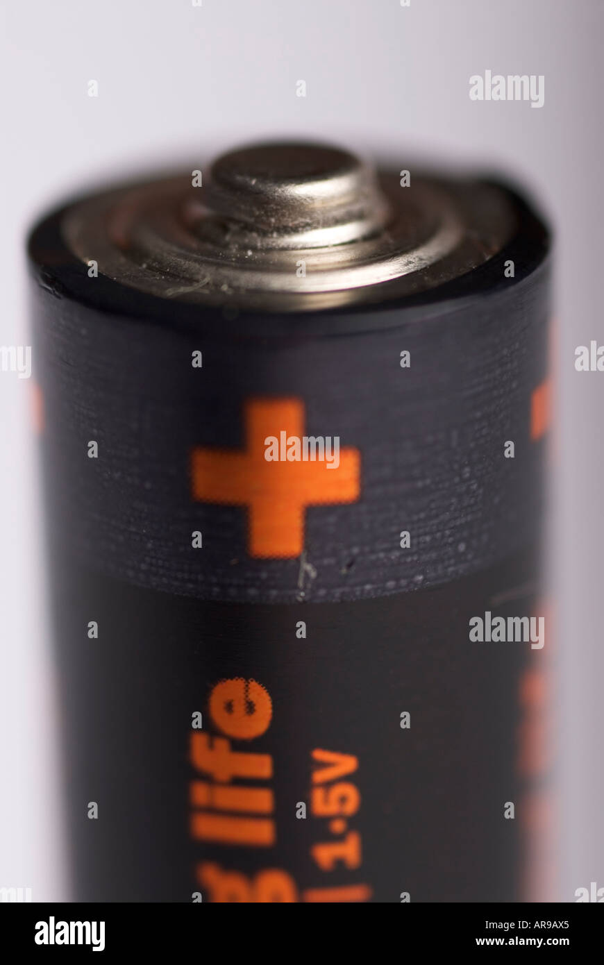 Image of the positive contact of a small battery Stock Photo - Alamy