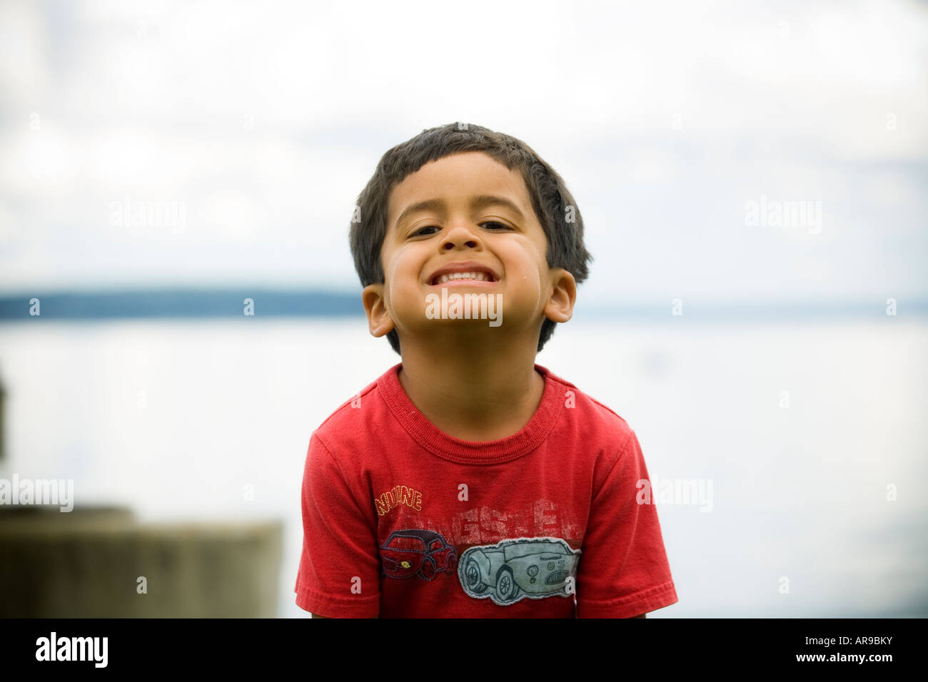 Young silly boy playing Stock Photo - Alamy