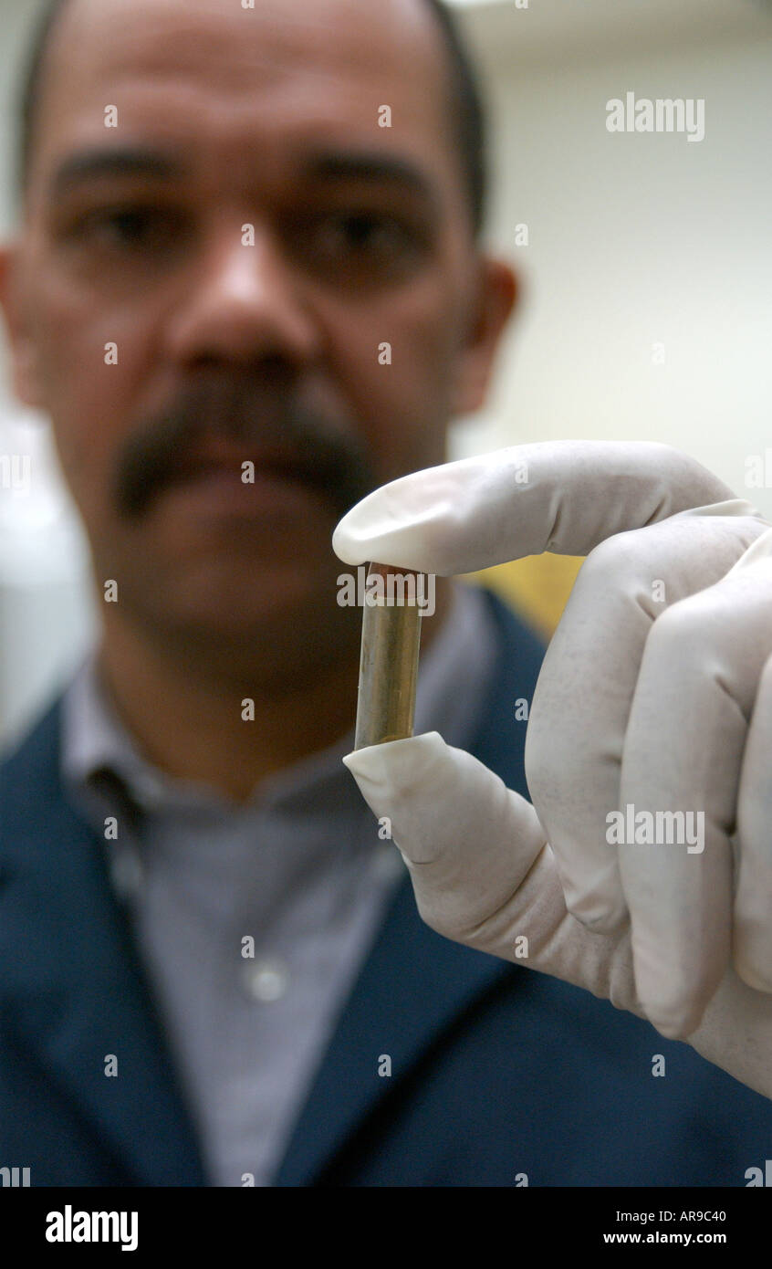 Police forensics examiner using technology to catch criminals Stock ...