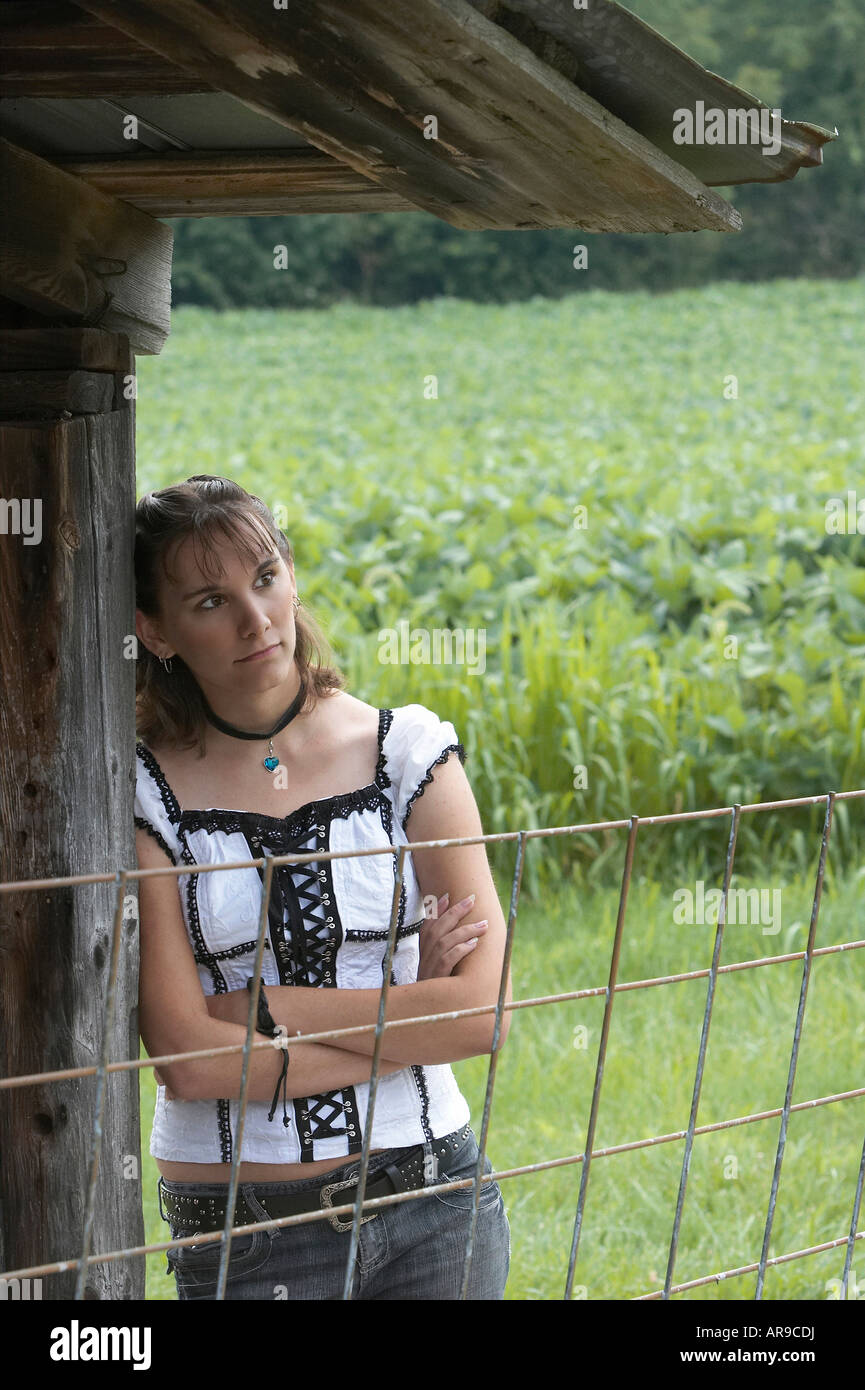 Young woman sad grin hi-res stock photography and images - Alamy