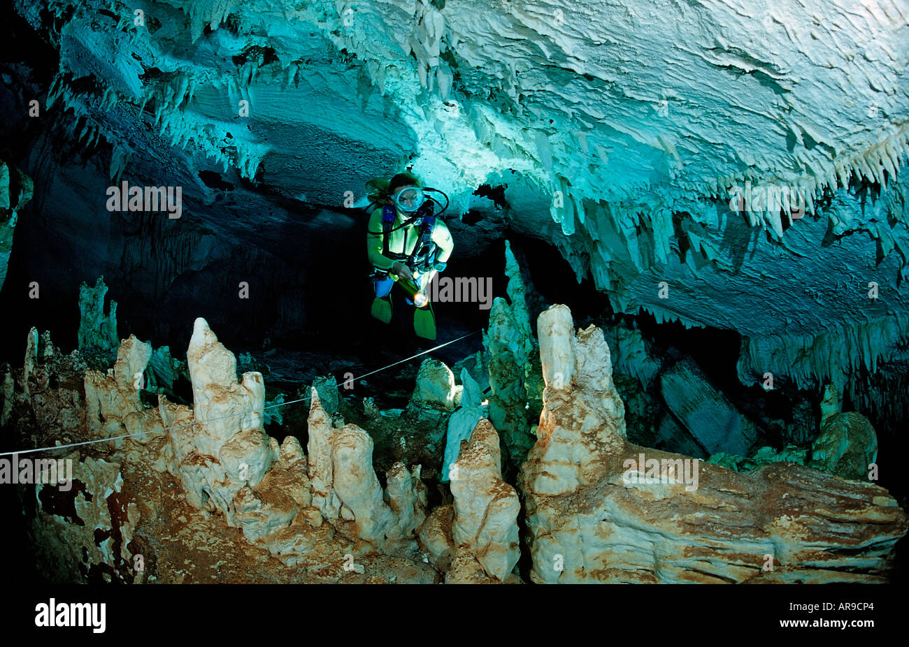 Scuba diver in underwater cave Cueva Taina Punta Cana Freshwater ...