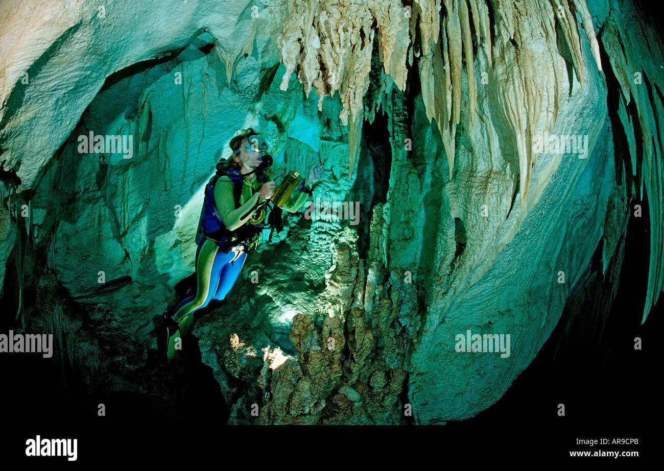 Scuba diver in underwater cave Cueva Taina Punta Cana Freshwater ...
