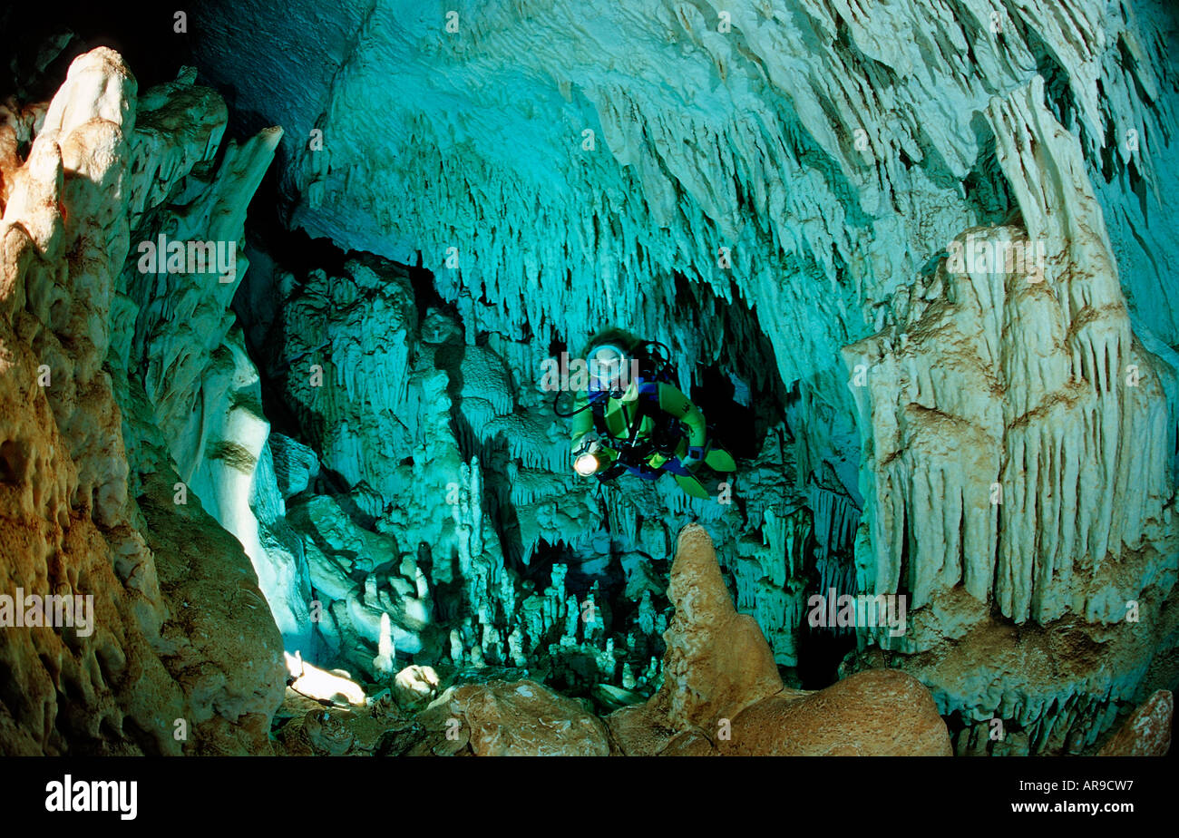 Scuba diver in underwater cave Cueva Taina Punta Cana Freshwater ...