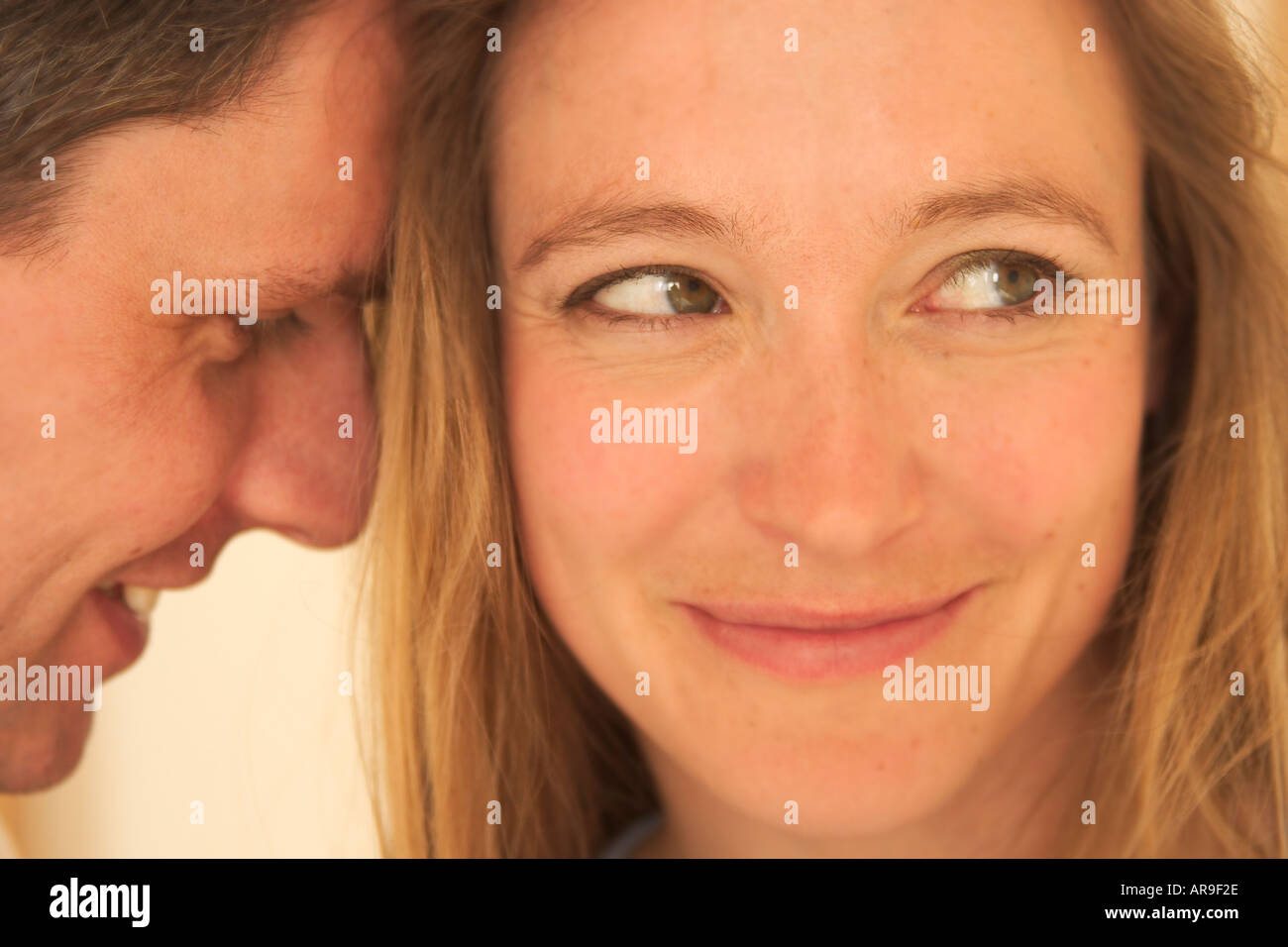 Man leans his forehead tenderly against the face of his partner Stock ...