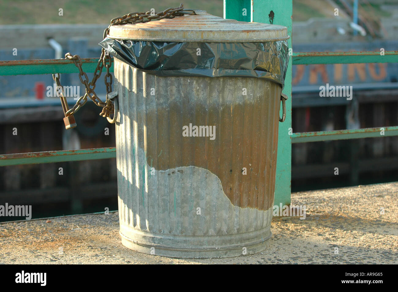 Garbage Pail Chained Stock Photo - Alamy