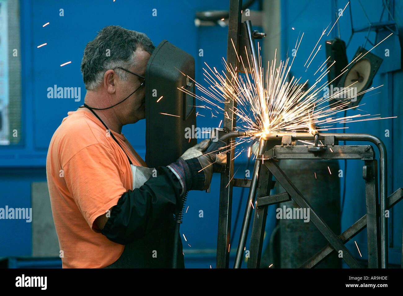 Welding factory close up boy man male work occupation job ability skill ...
