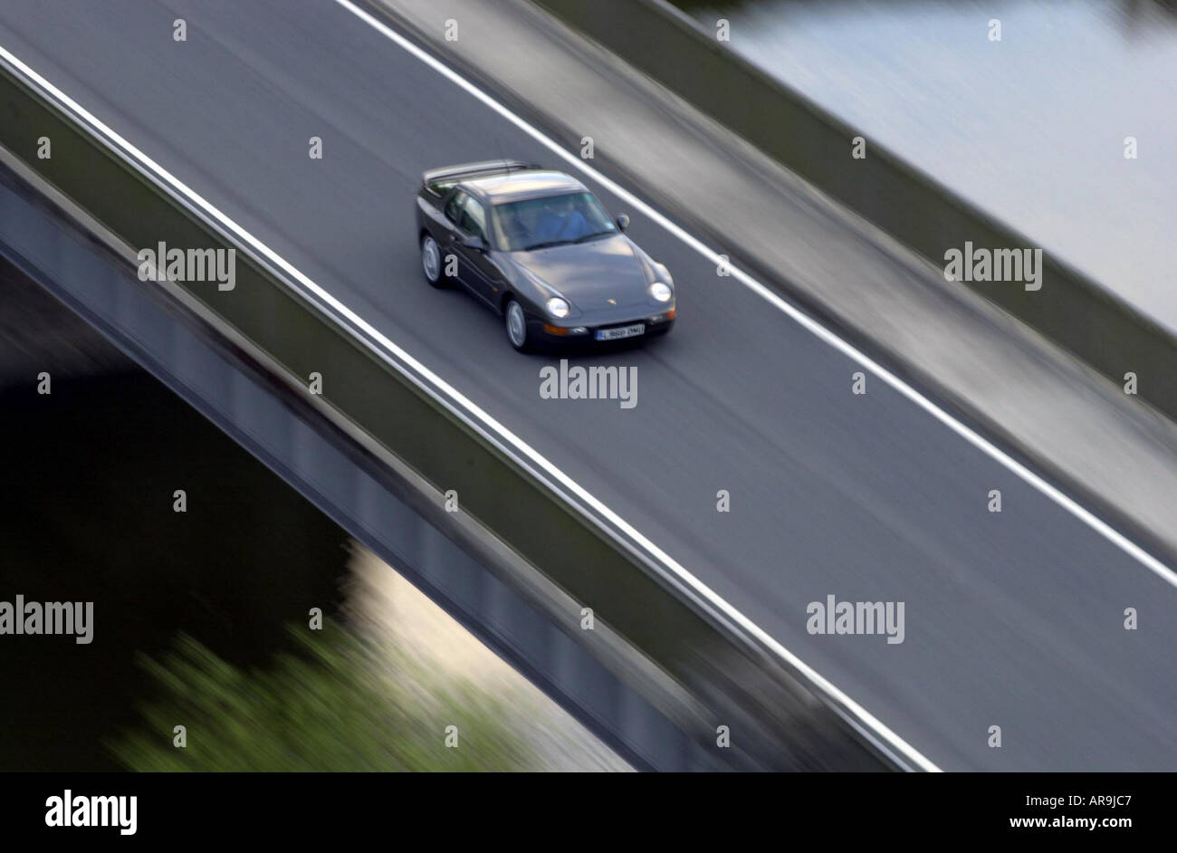 Porsche 928 Crossing Bridge over River Trapp Carmarthenshire West Wales ...