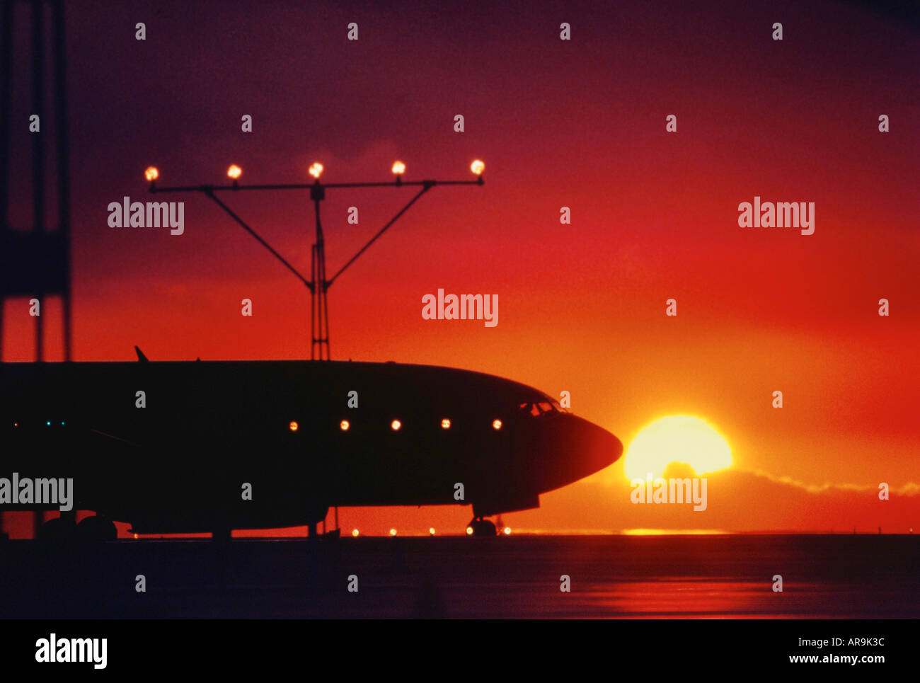 Boeing 737 jet on the runway for take off landing approach lights ...