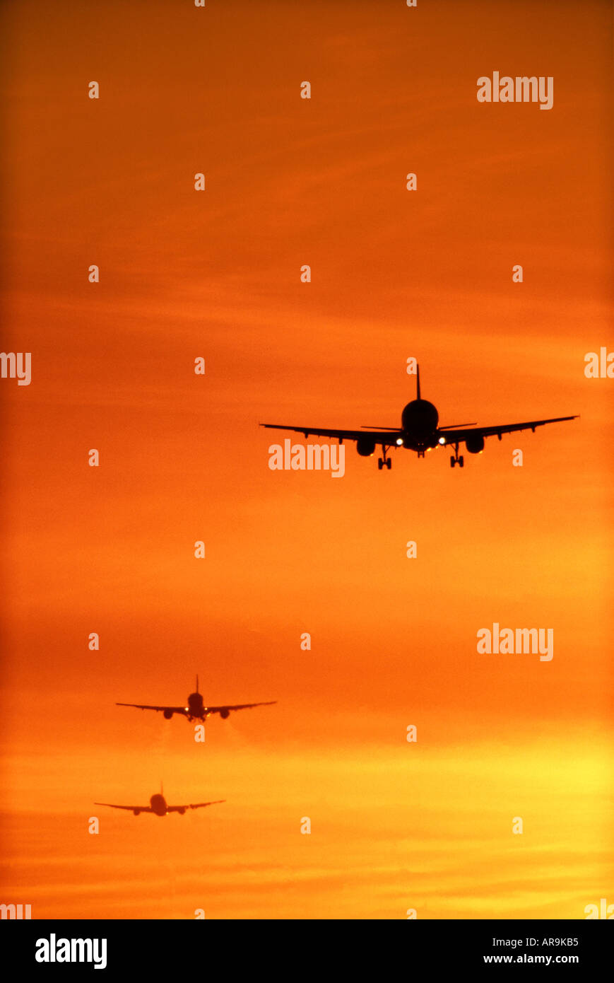 Airbus A320 jet airliner and two others busy and close on final ...