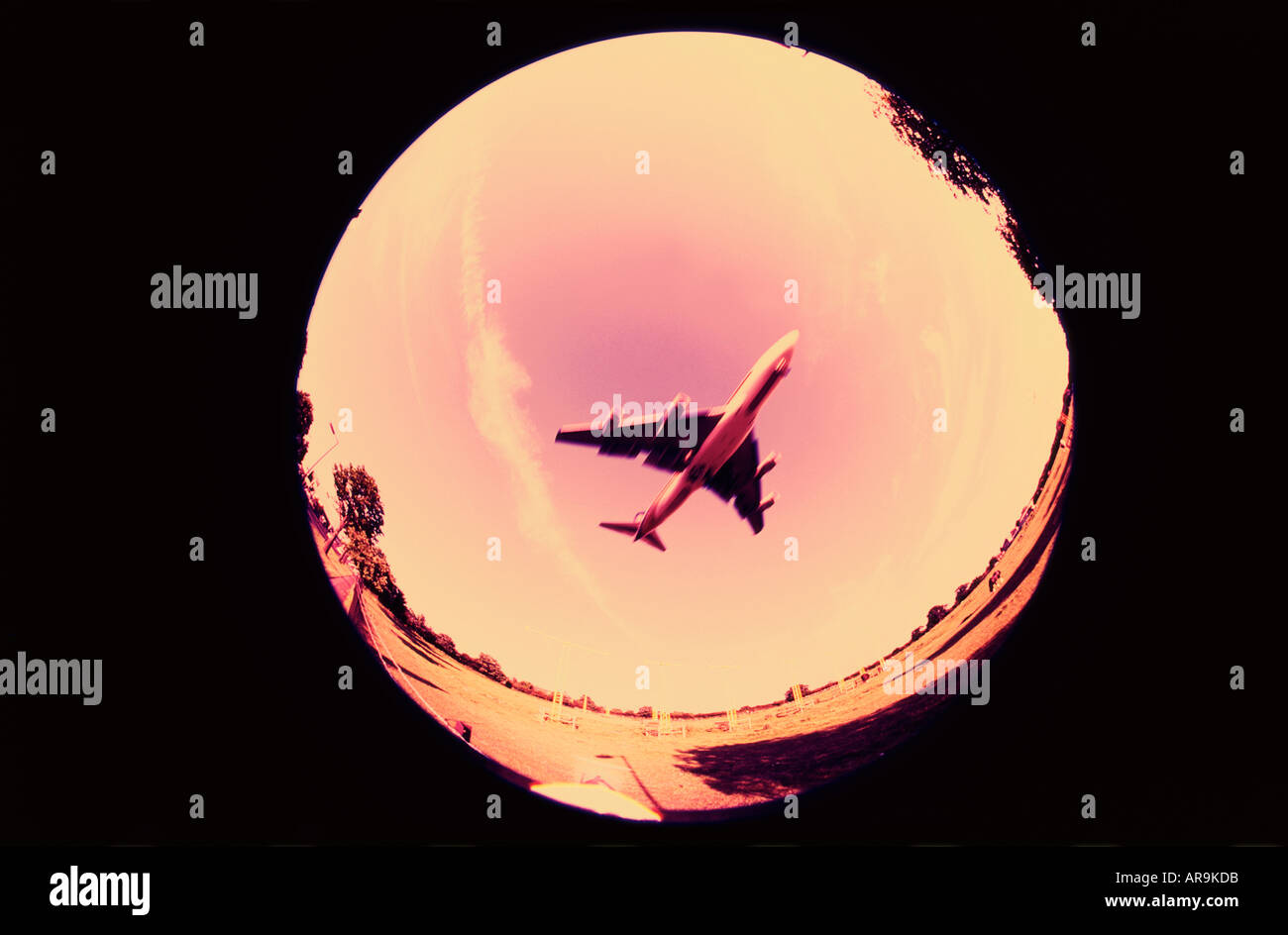 Boeing 747 jumbo jet airliner flying, circle round frame shape and ...