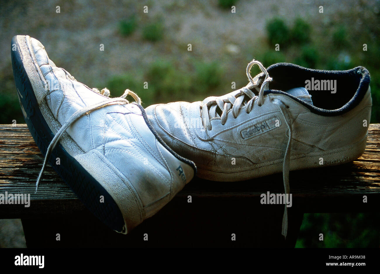 Old Tennis Shoes Stock Photo - Alamy