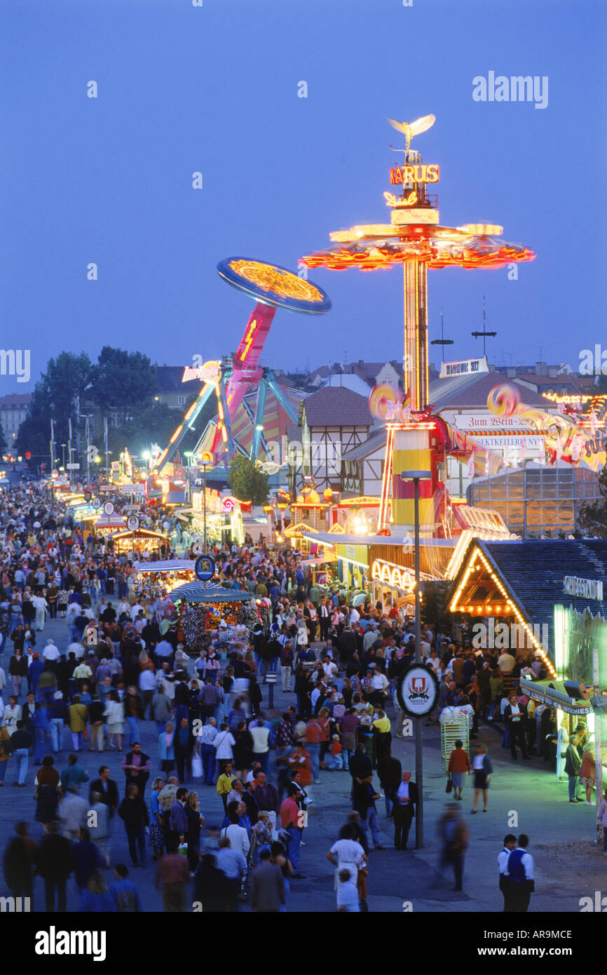 The Oktoberfest rides and crowds at night in Munich Stock Photo - Alamy