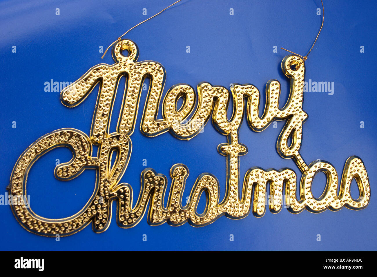 GOLD MERRY CHRISTMAS SIGN Stock Photo - Alamy