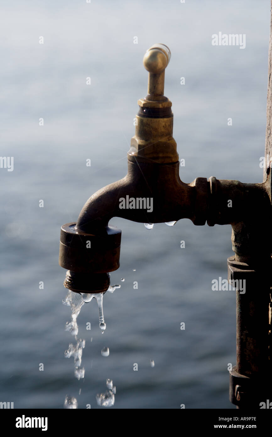 RUNNING WATER FROM A OUTDOOR TAP Stock Photo - Alamy