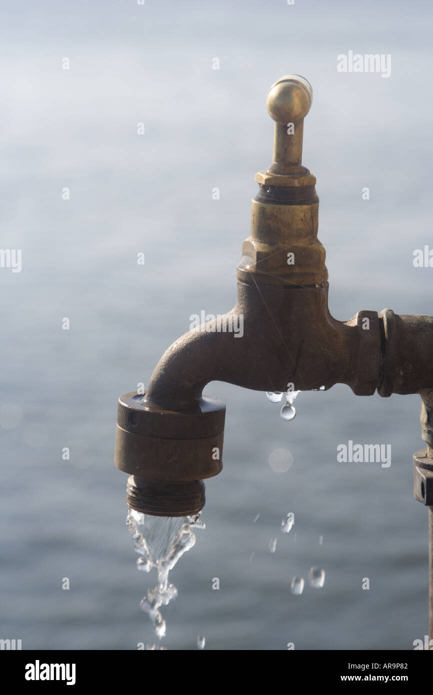 RUNNING WATER FROM A OUTDOOR TAP Stock Photo - Alamy