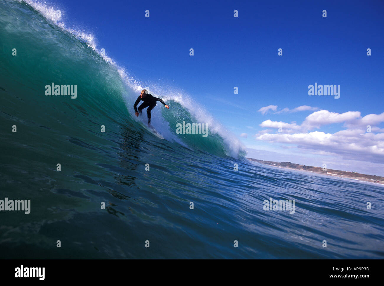 Surfing in Jersey Channel Islands Stock Photo - Alamy
