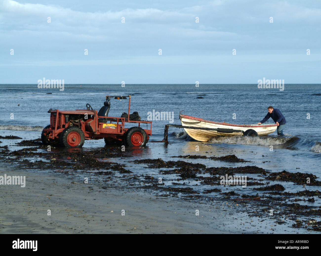 Fisherman Beaching Boat Using Old Land Rover Chassis and Trailer from ...