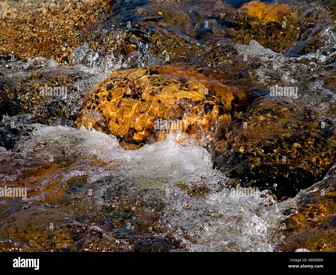 Water flowing over rocks Stock Photo - Alamy