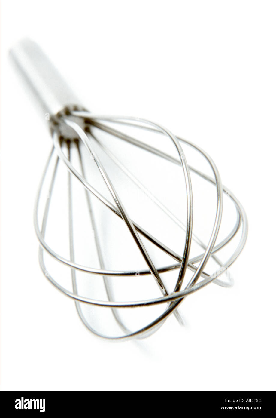 Chrome food whisk on white background Stock Photo - Alamy