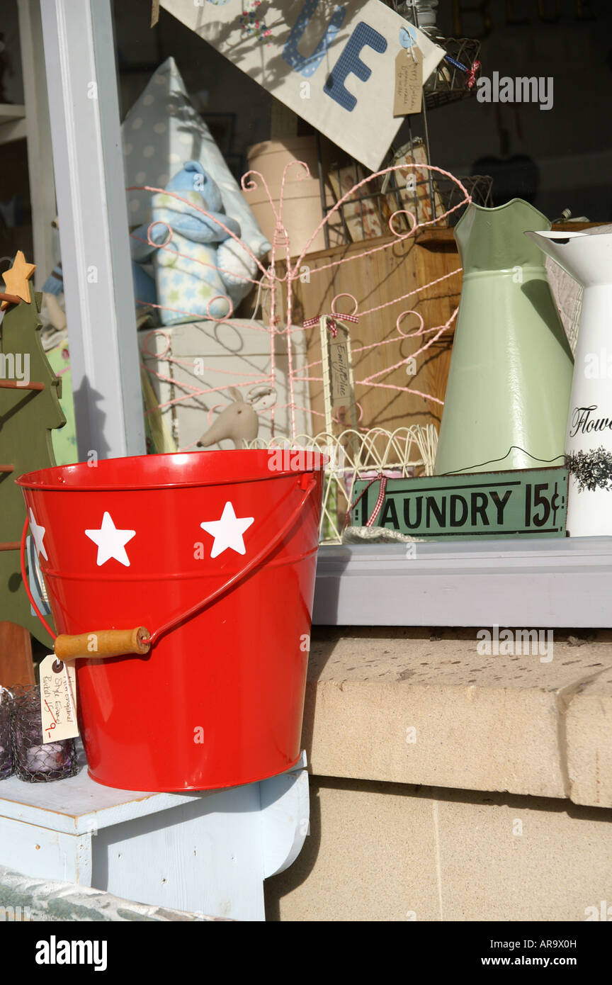 Red bucket with white Stars for sale in a shop window in Stroud ...