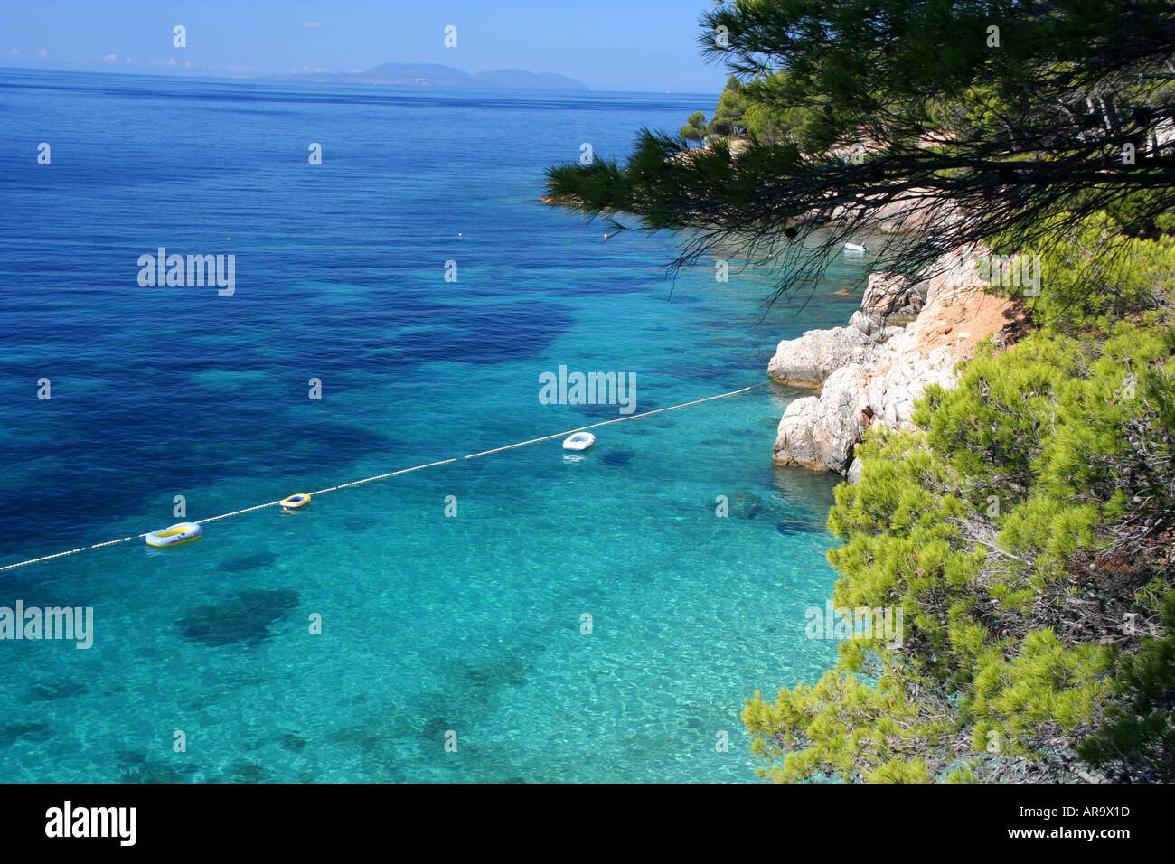 A spectacular sapphire bay near camping site in Jagodna village on Hvar ...