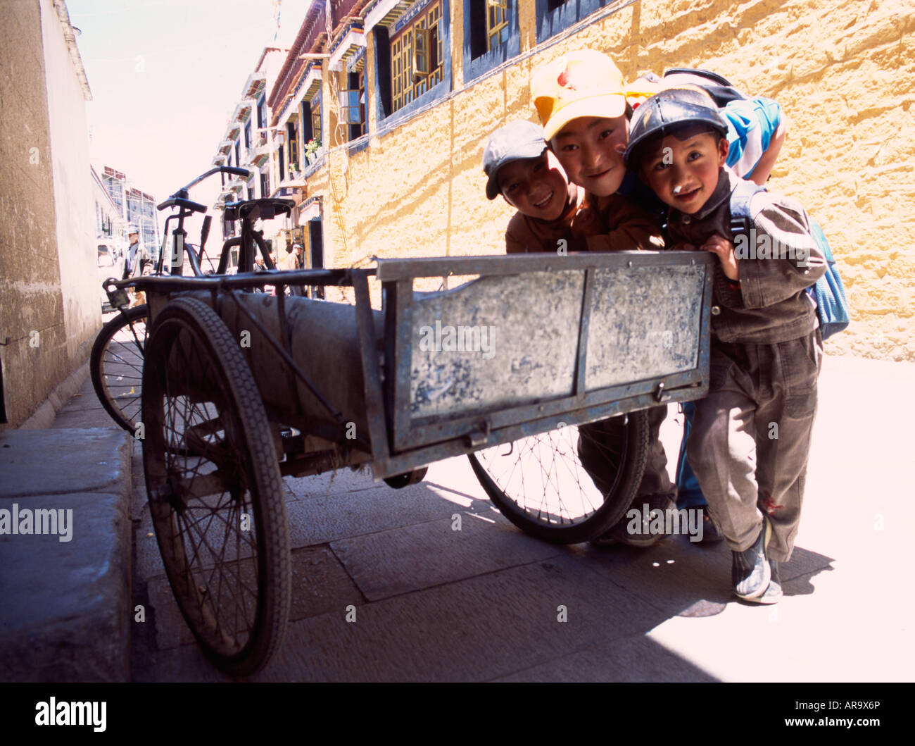 Tibetan children in street, Lhasa, Tibet Stock Photo - Alamy