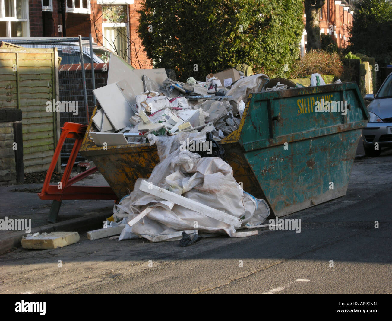 Overloaded skip hi-res stock photography and images - Alamy