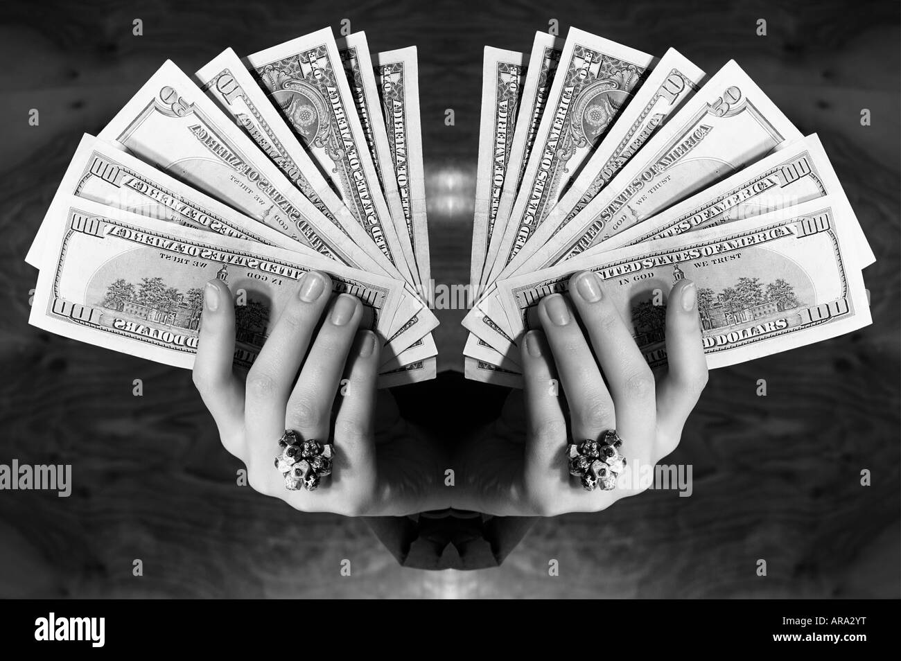 Two hands with dollars fan Stock Photo - Alamy