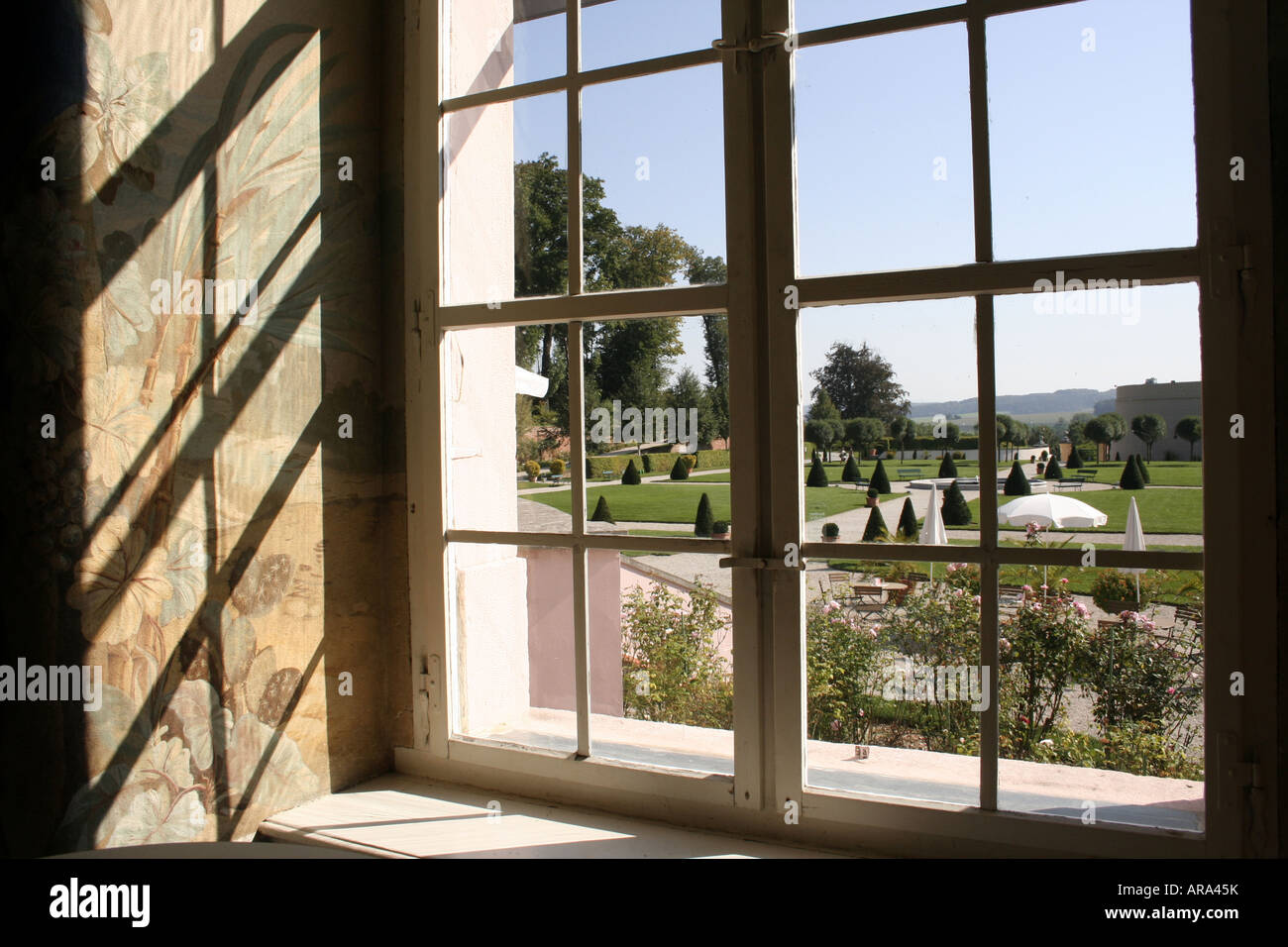 Big yard seen trough a window Stock Photo - Alamy