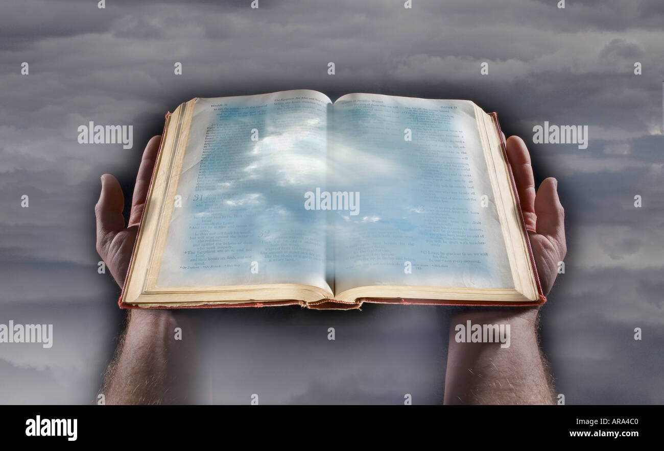 Hands Praying With Bible Stock Photo - Alamy