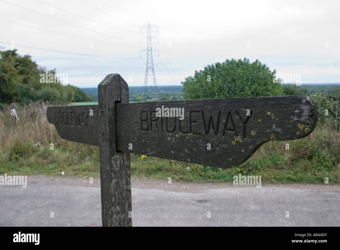 Wooden bridleway sign on country roadside Stock Photo - Alamy