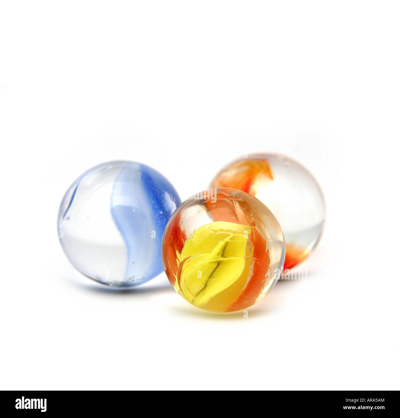Marbles on a white background Stock Photo - Alamy