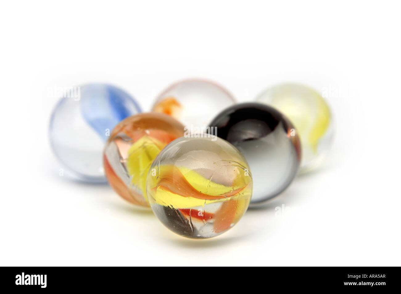 Marbles on a white background Stock Photo - Alamy