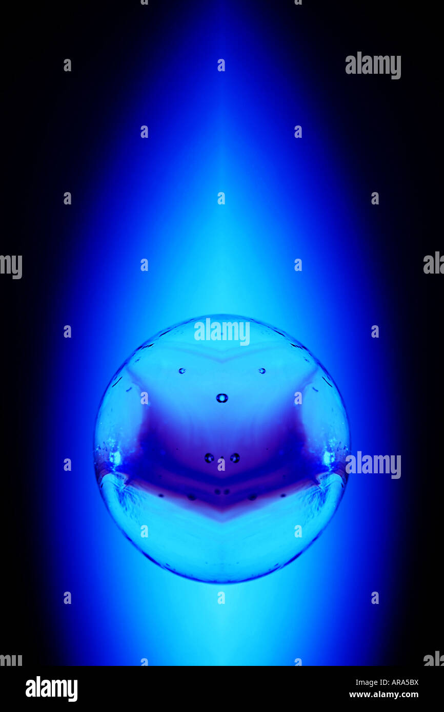 Marble ball and a mauve light Stock Photo - Alamy