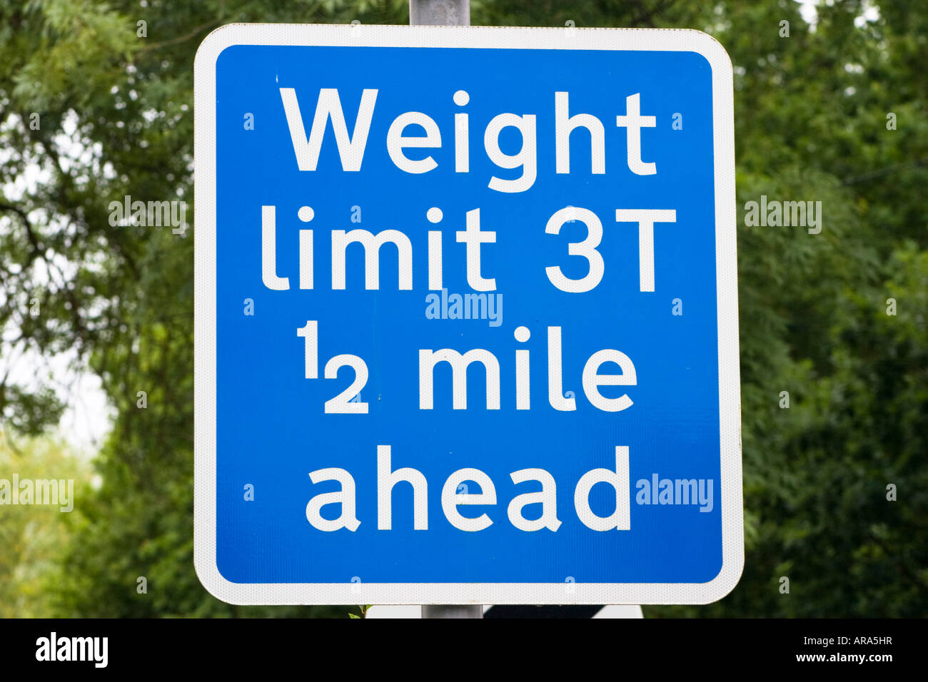 Square blue weight limit 3 tonnes half a mile ahead road sign Stock ...