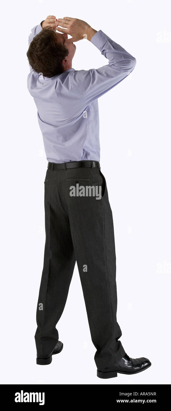 Man looking upwards Stock Photo - Alamy